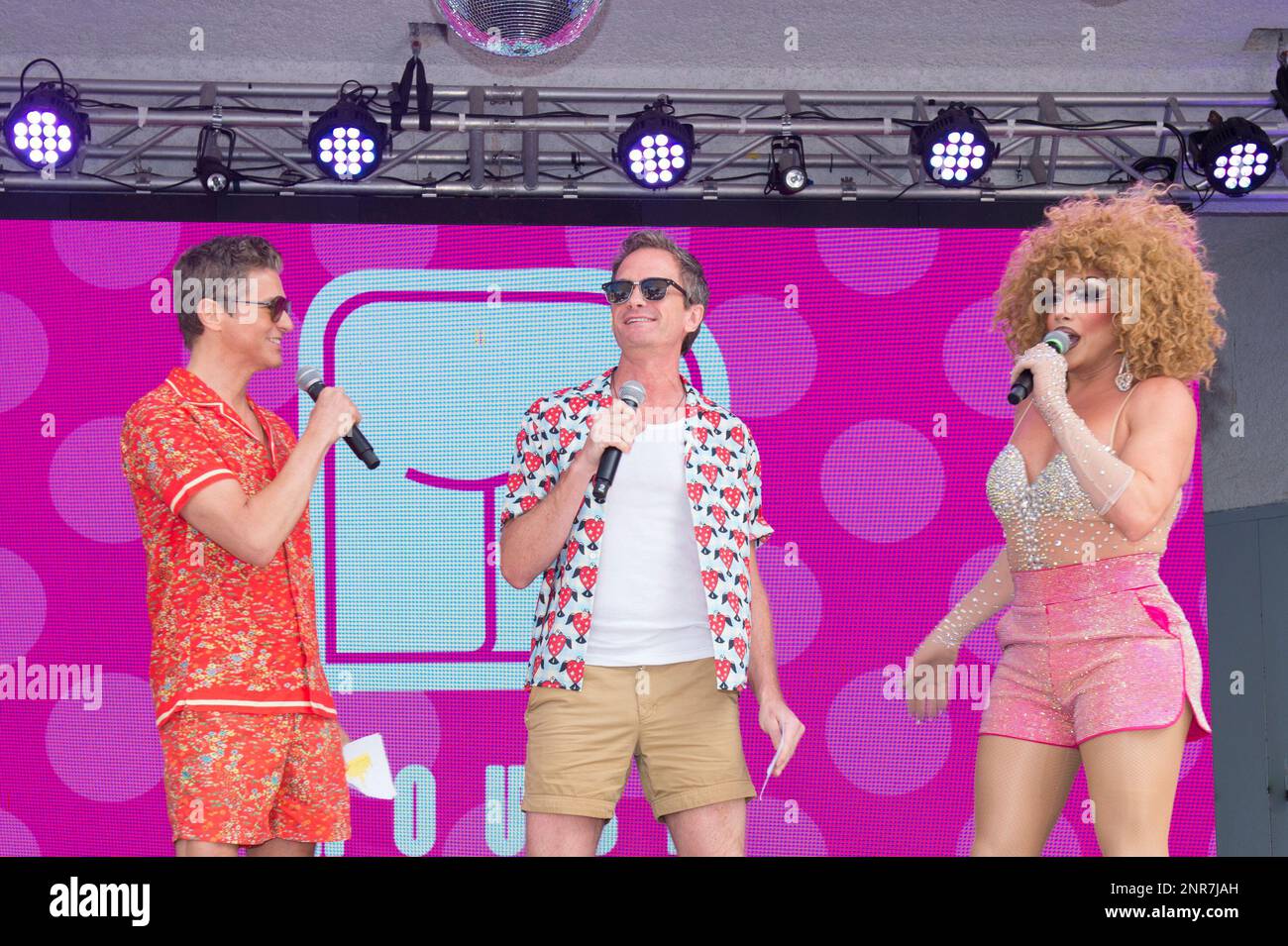 David Burrtka, from left, Neil Patrick Harris, and Athena Dion appear ...