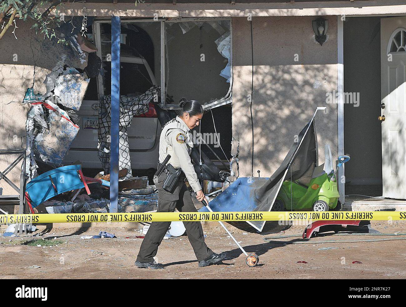 Yuma County Sheriff's Office Deputy Maria Rosales takes measurements at ...