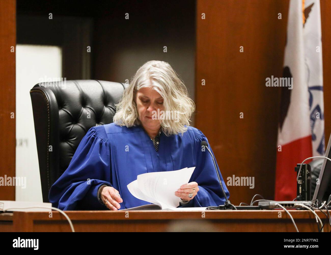 Sixth Judicial District Judge Fae Hoover looks through the verdict form ...