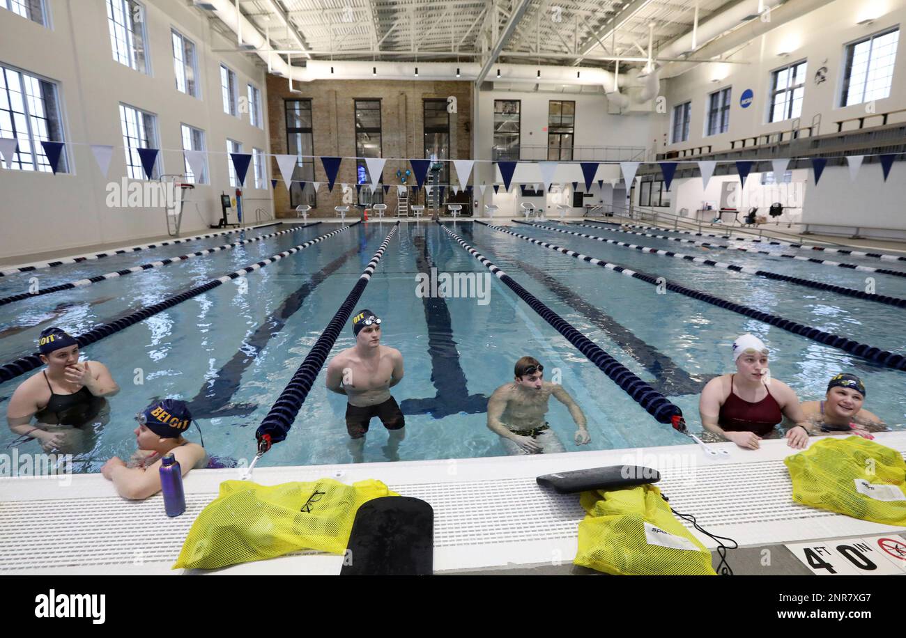 Members of the Beloit College swim team practice in the new pool ...