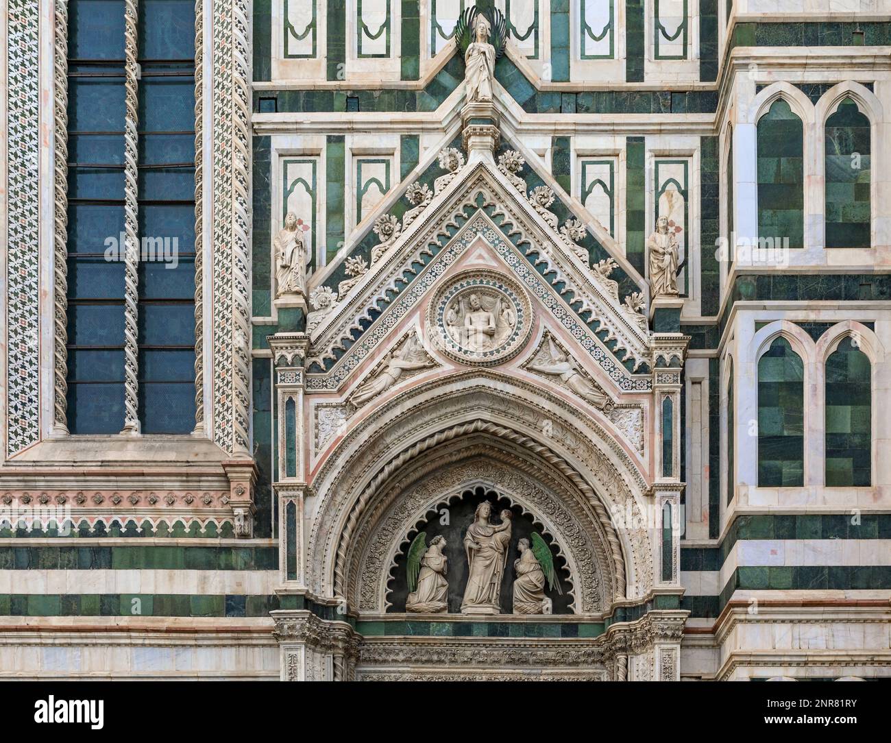 Ornate colorful marble facade of the Duomo Cathedral or Cattedrale di ...