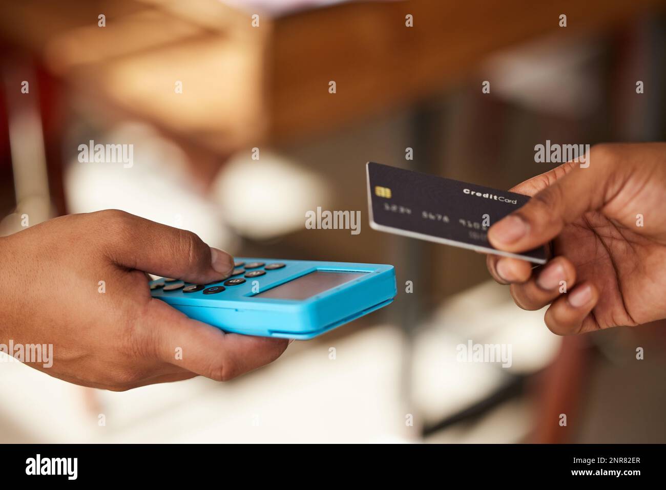 Credit card, hands and payment on pos machine for fintech, banking or ...