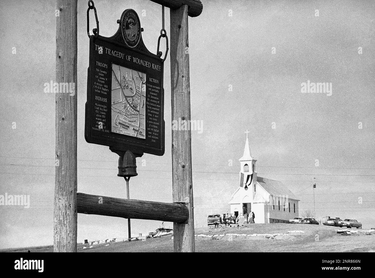 FILE - A historical marker commemorating the Wounded Knee Massacre of ...