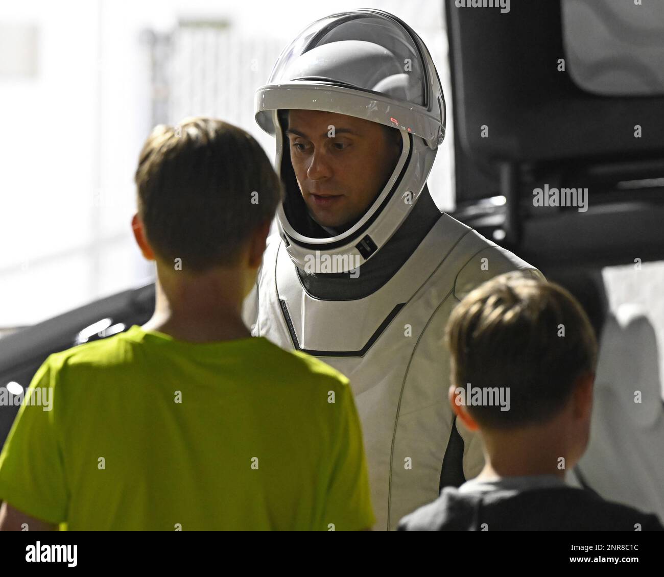 Russian Cosmonaut Andrey Fedyaev speaks to friends and family after walking out from the Neil ...