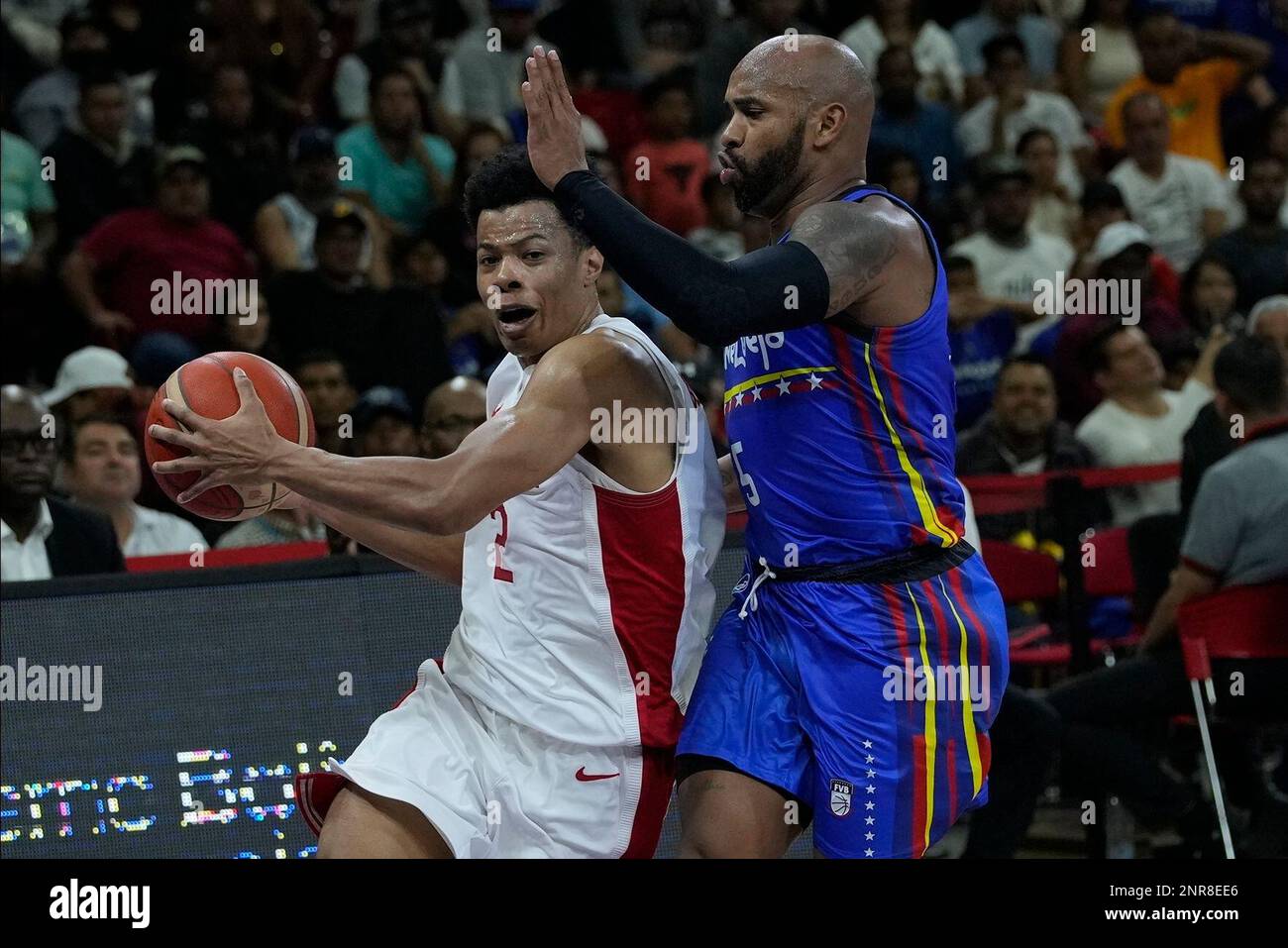 Canada'S Trae Bell-Haynes, left, and Venezuela's Gregory Vargas battle ...