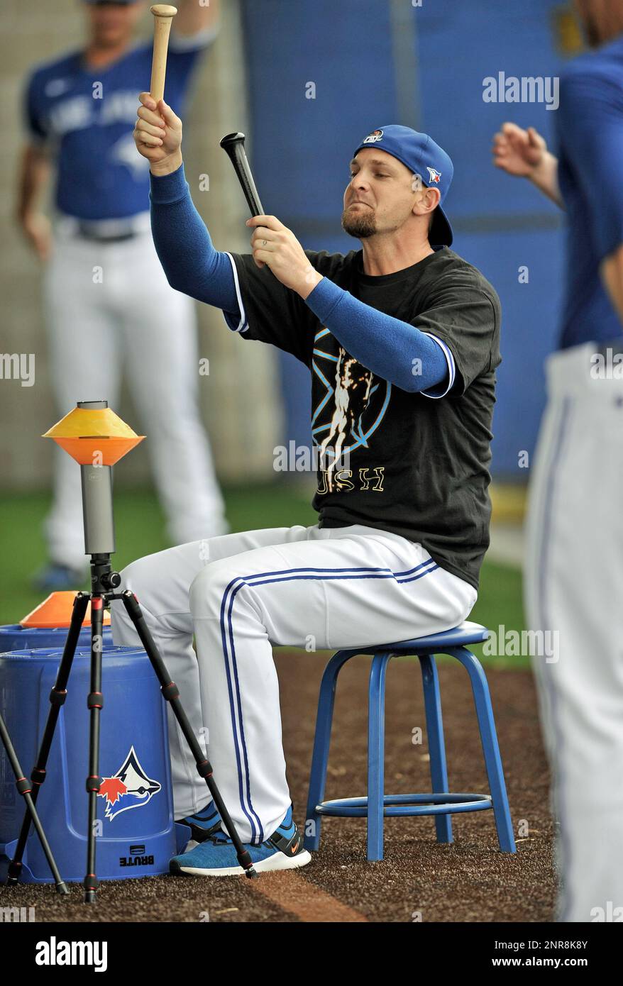 Toronto Blue Jays catcher Caleb Joseph plays air drums to the music of ...