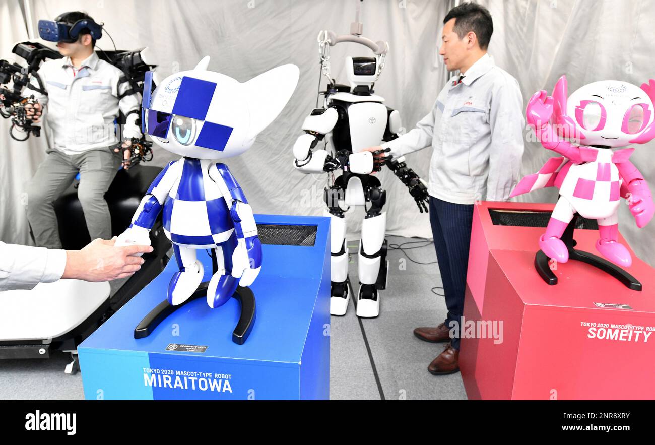 Robots of Tokyo Olympics Mascot Miraitowa(front, L), Someity (front, R ...