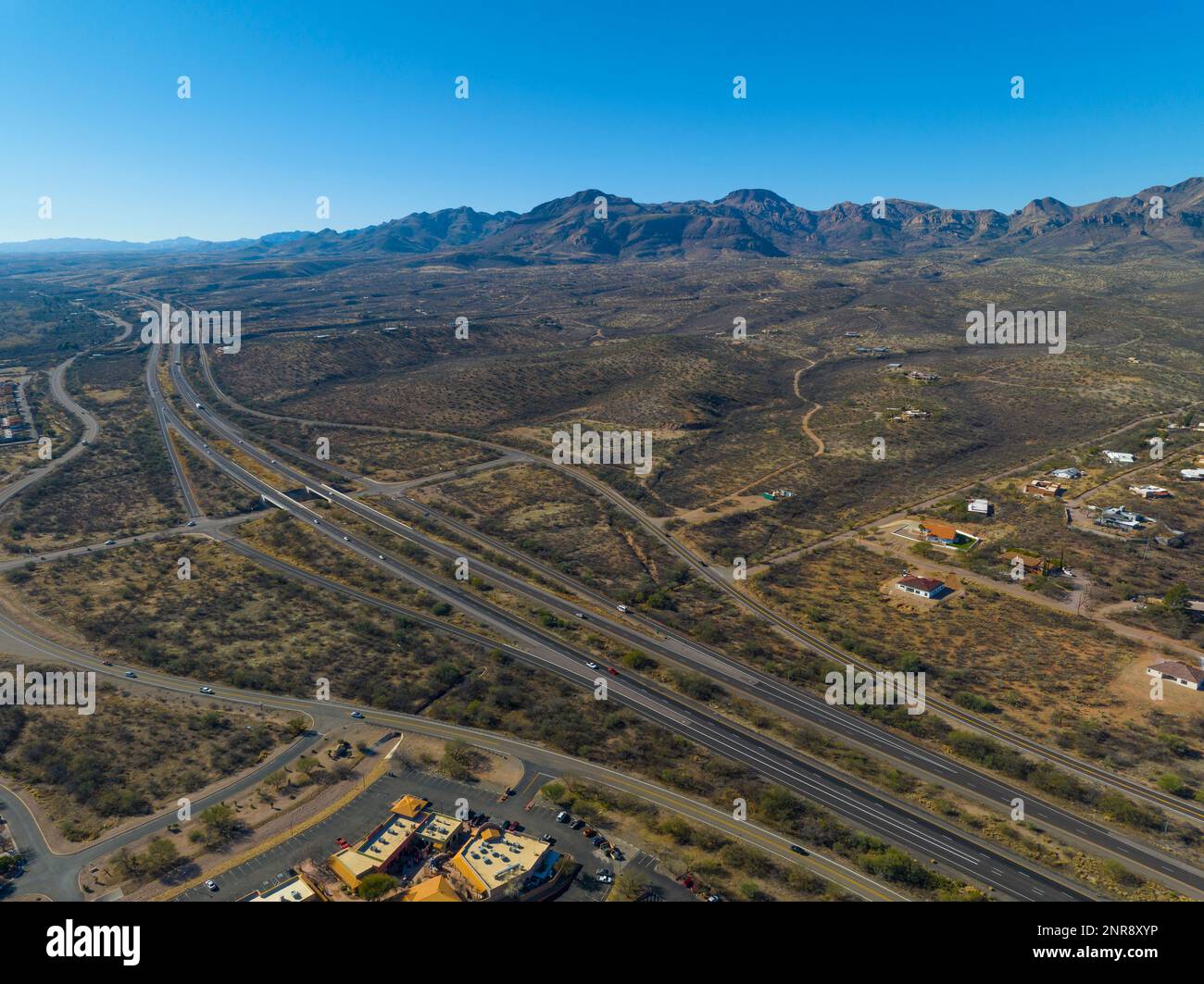 Interstate Highway 19 aerial view with Tumacacori Mountains at the back ...