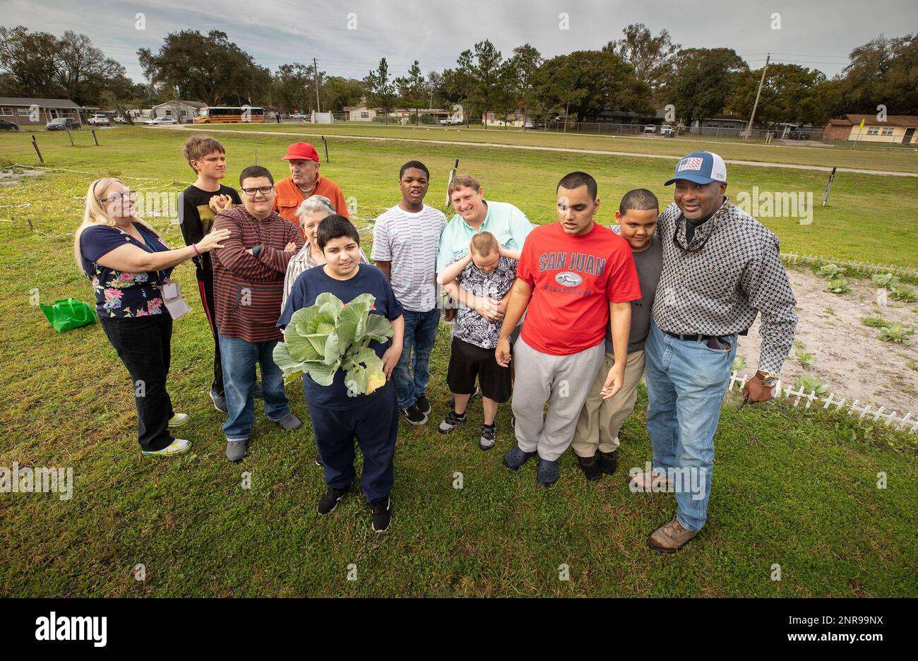 In this Feb. 4, 2020 photo, students and faculty members pose for a ...
