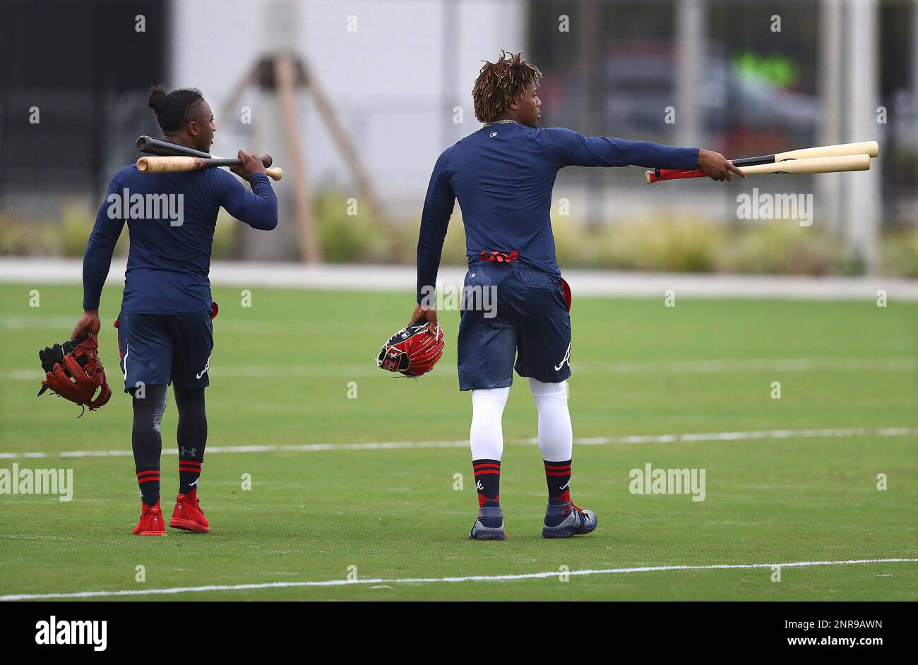 Atlanta Braves second baseman Ozzie Albies, left, and outfielder Ronald ...