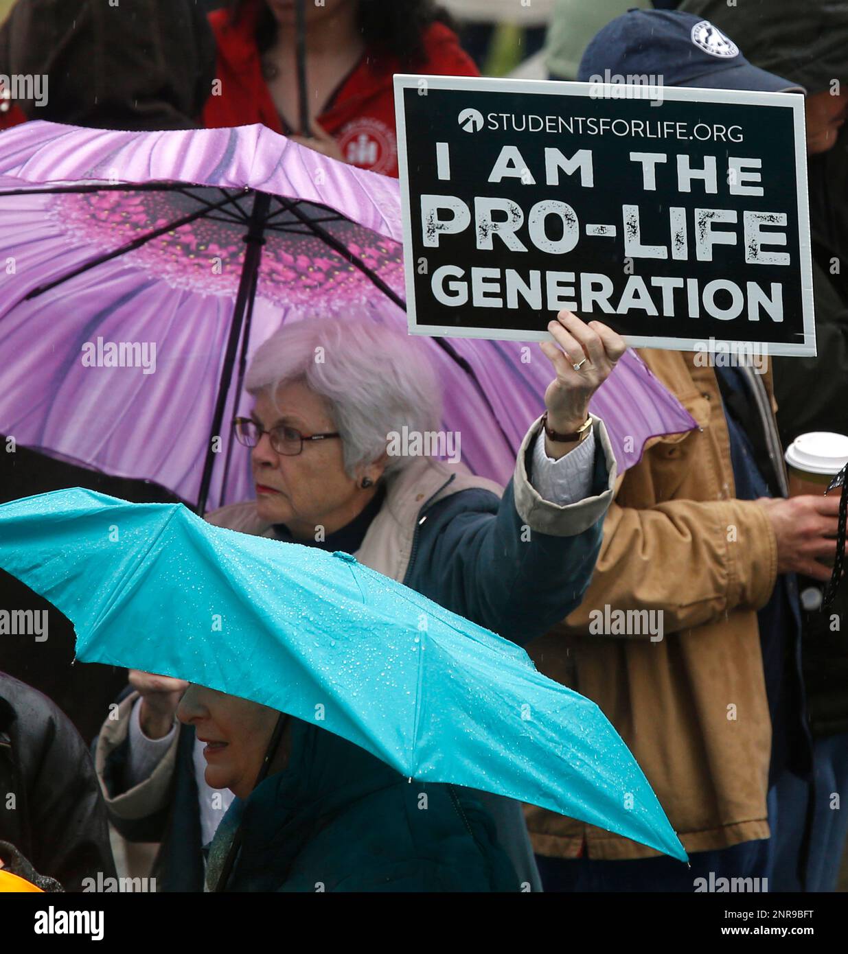 A demonstrator holds up a sign during the Virginia March for Life rally ...