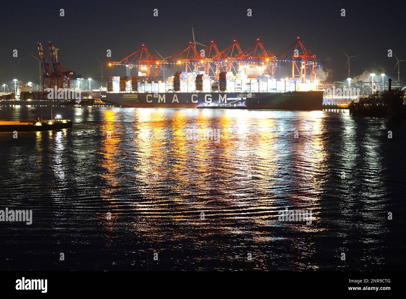 Hamburg, Germany. 27th Feb, 2023. A container ship is handled in the ...