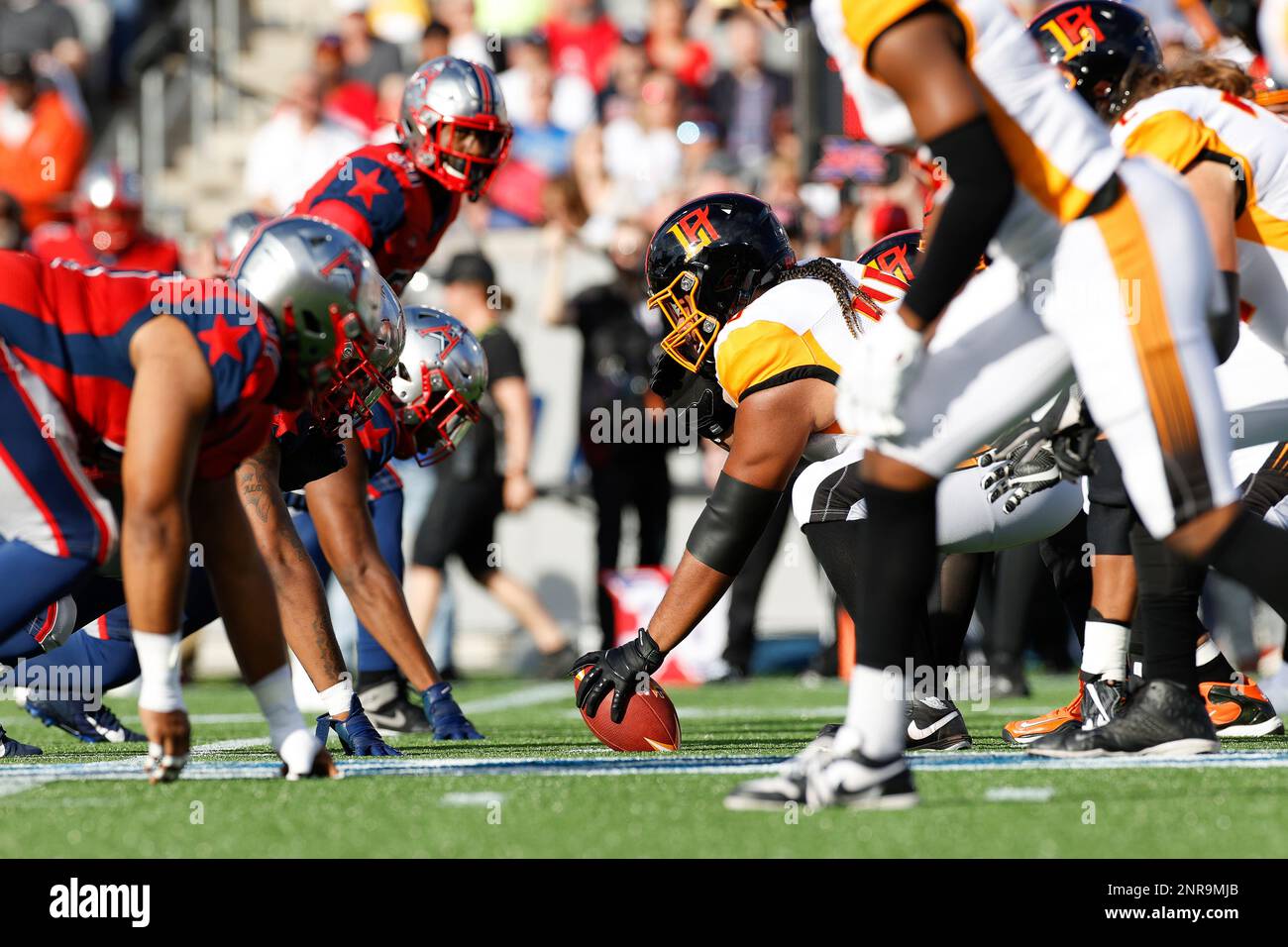 The LA Wildcats offensive line lines up across the Houston Roughnecks ...
