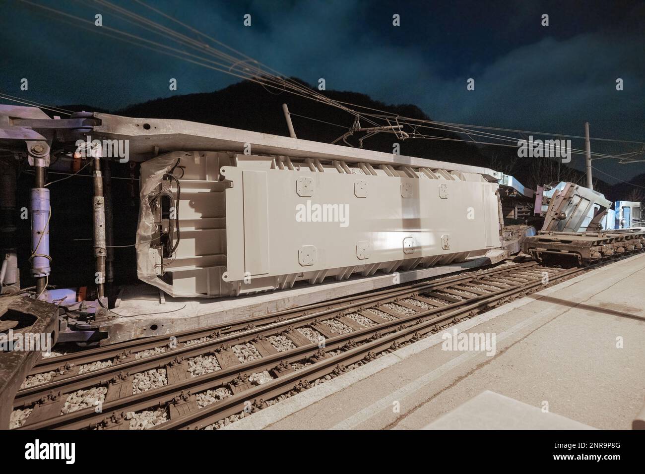 Heavy and wide load of electric transformer on a special train rolled ...