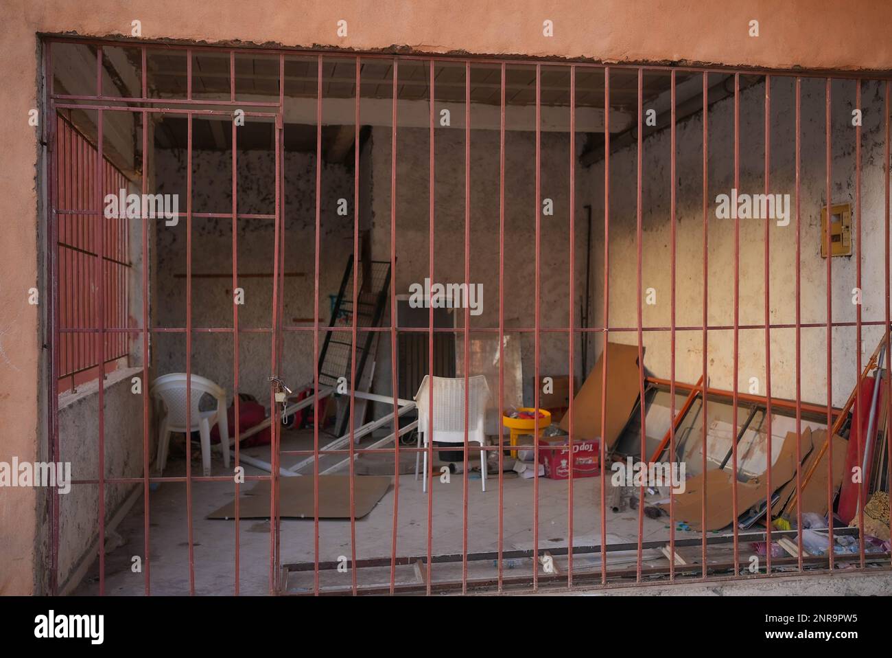 basement warehouse cage with old rusty bars Stock Photo - Alamy