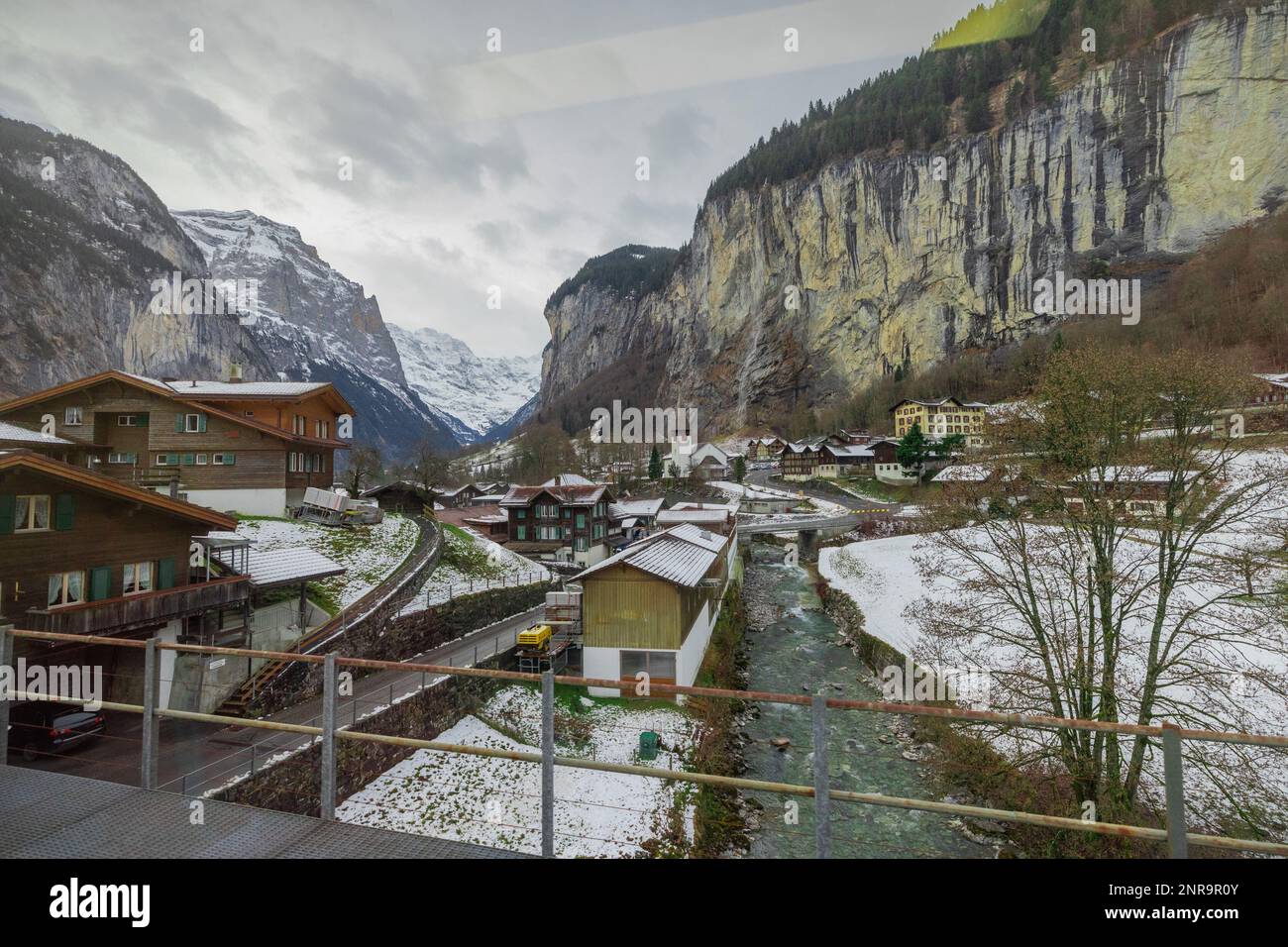 View of Lauterbrunnen valley while ascending with a cog railway towards ...