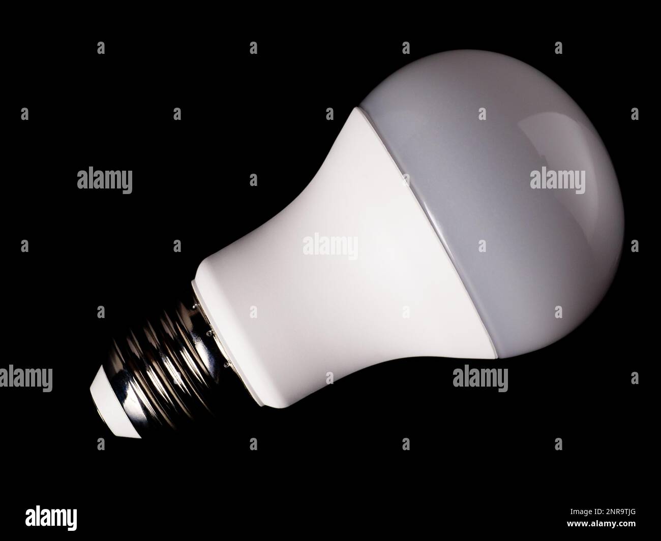 Light bulb isolated black background hi-res stock photography and ...