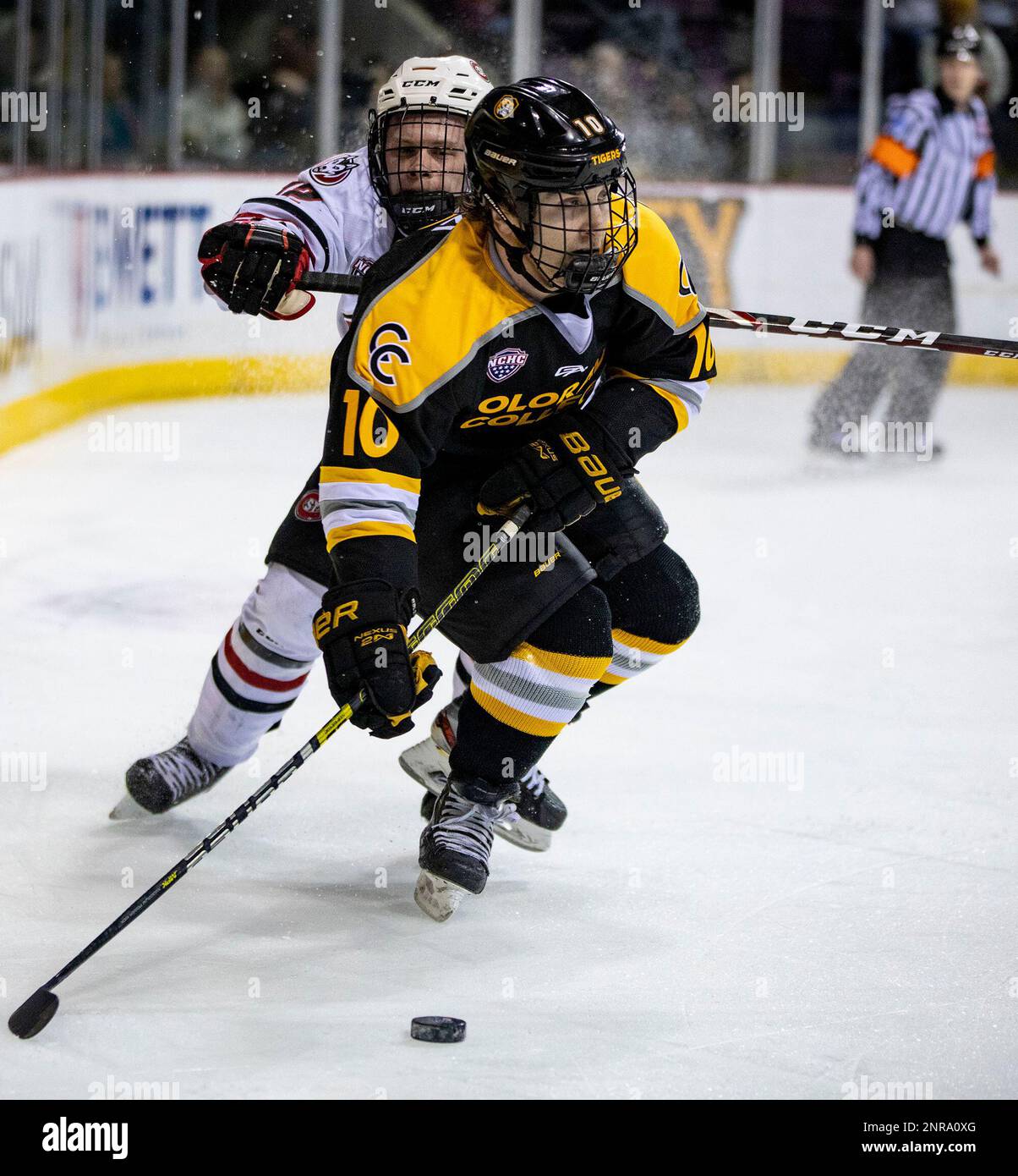Colorado College right wing Patrick Cozzi (10) gains possession of the ...