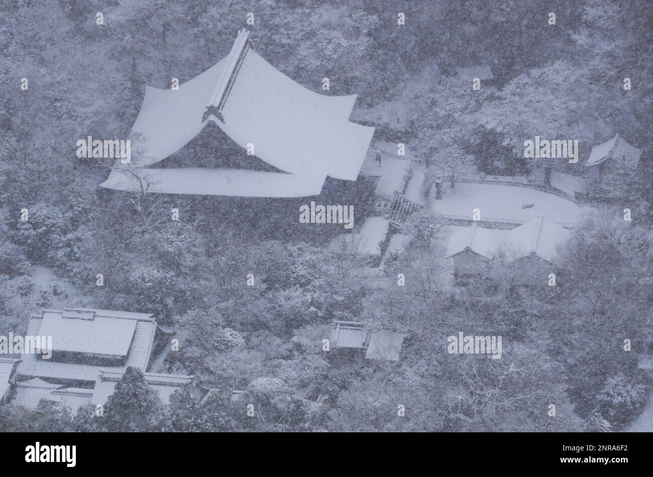 An aerial photo shows Sanzen-in covered with snow in Kyoto on February ...