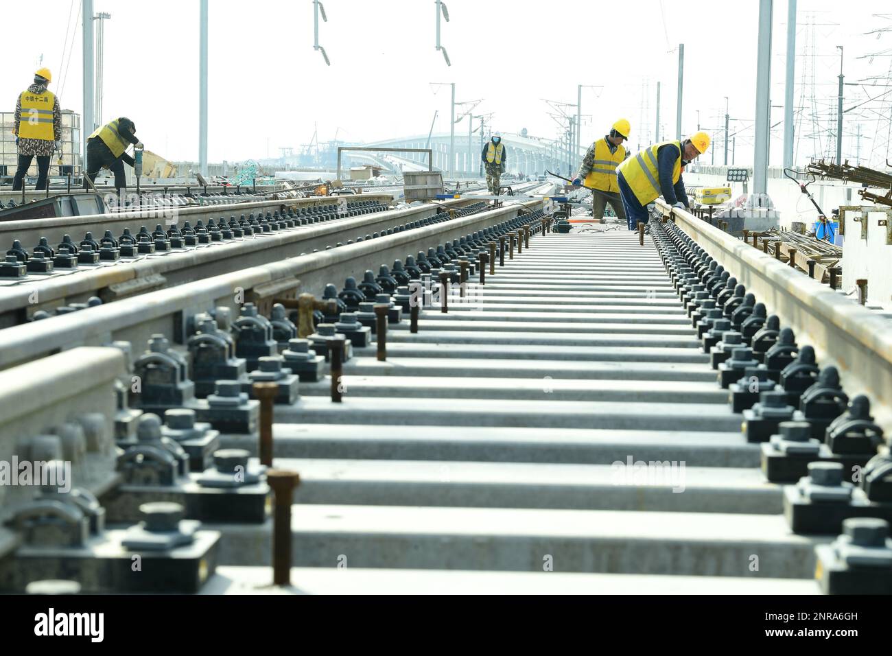 SUZHOU, CHINA - FEBRUARY 27, 2023 - Builders work on a ballastless ...