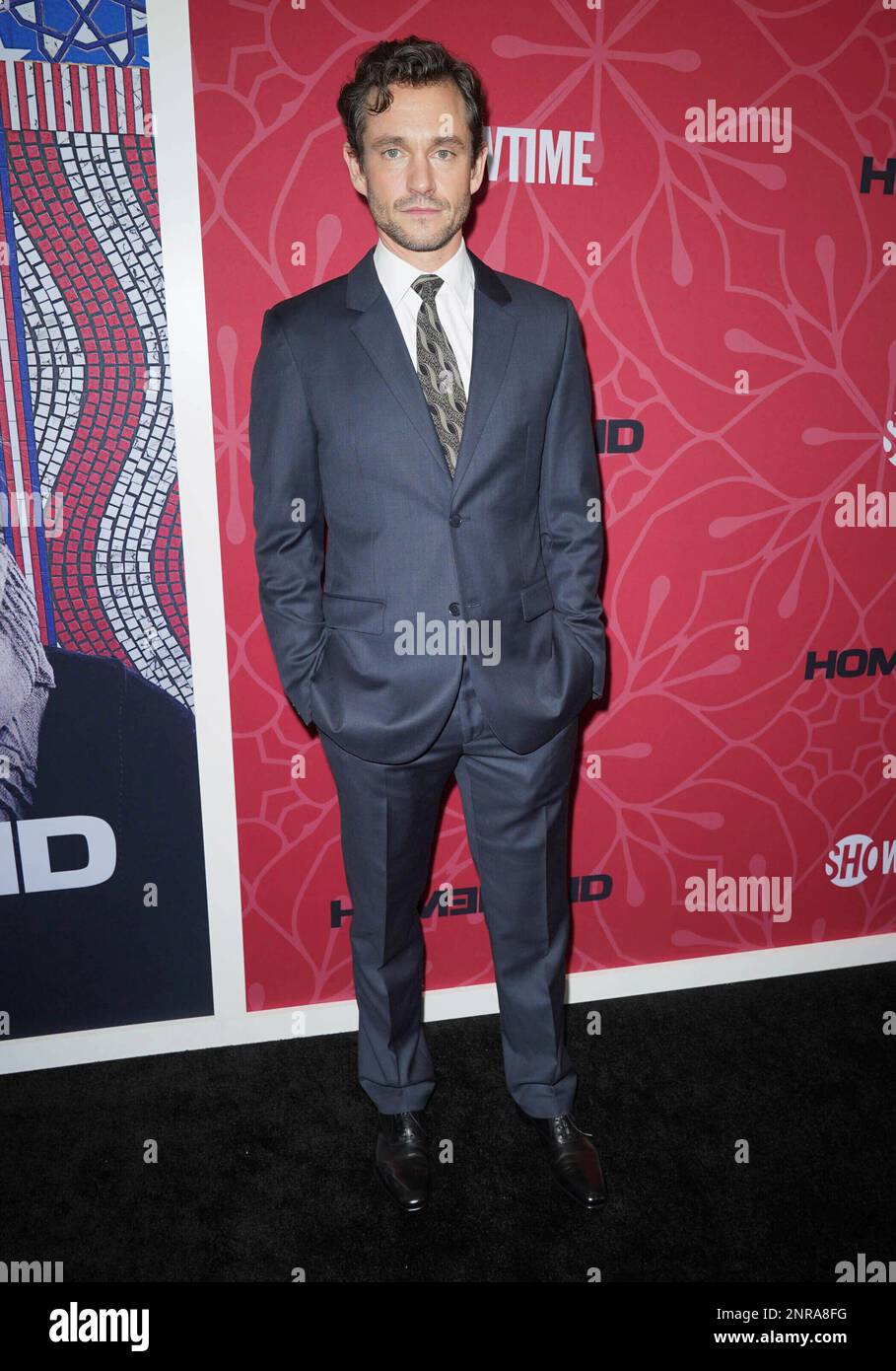 Photo by: John Nacion/STAR MAX/IPx 2020 2/4/20 Hugh Dancy at the season 8 premiere of "Homeland ...