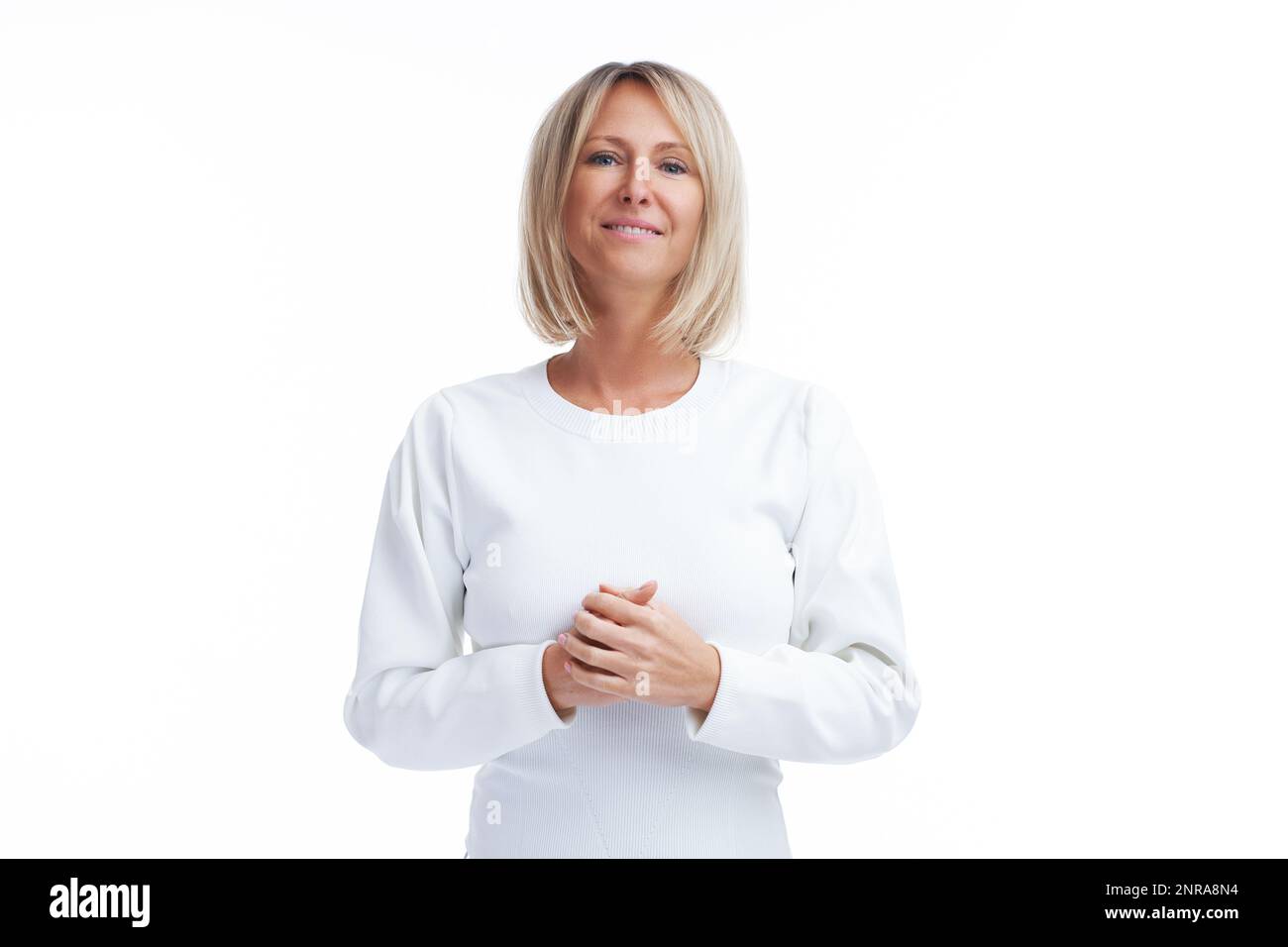 Picture of blonde woman over back isolated background Stock Photo - Alamy