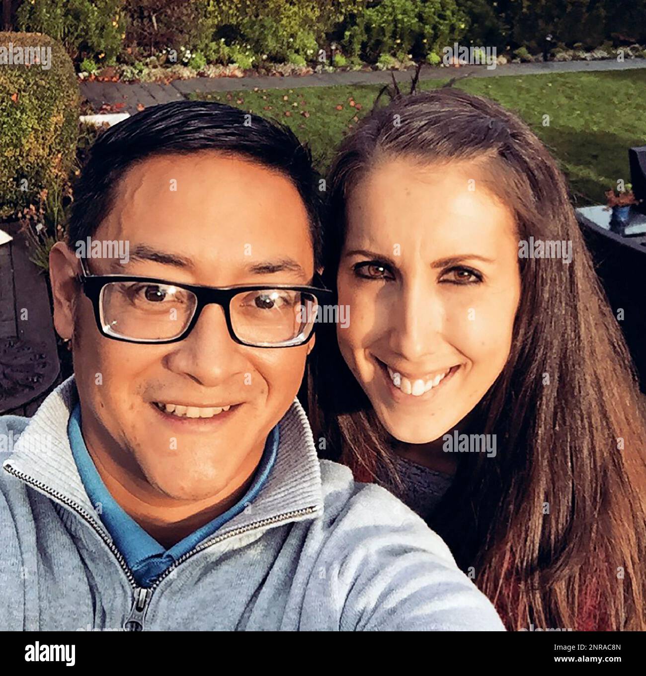 This undated photo provided by Eric Ikari shows Eric and Jennifer Ikari ...