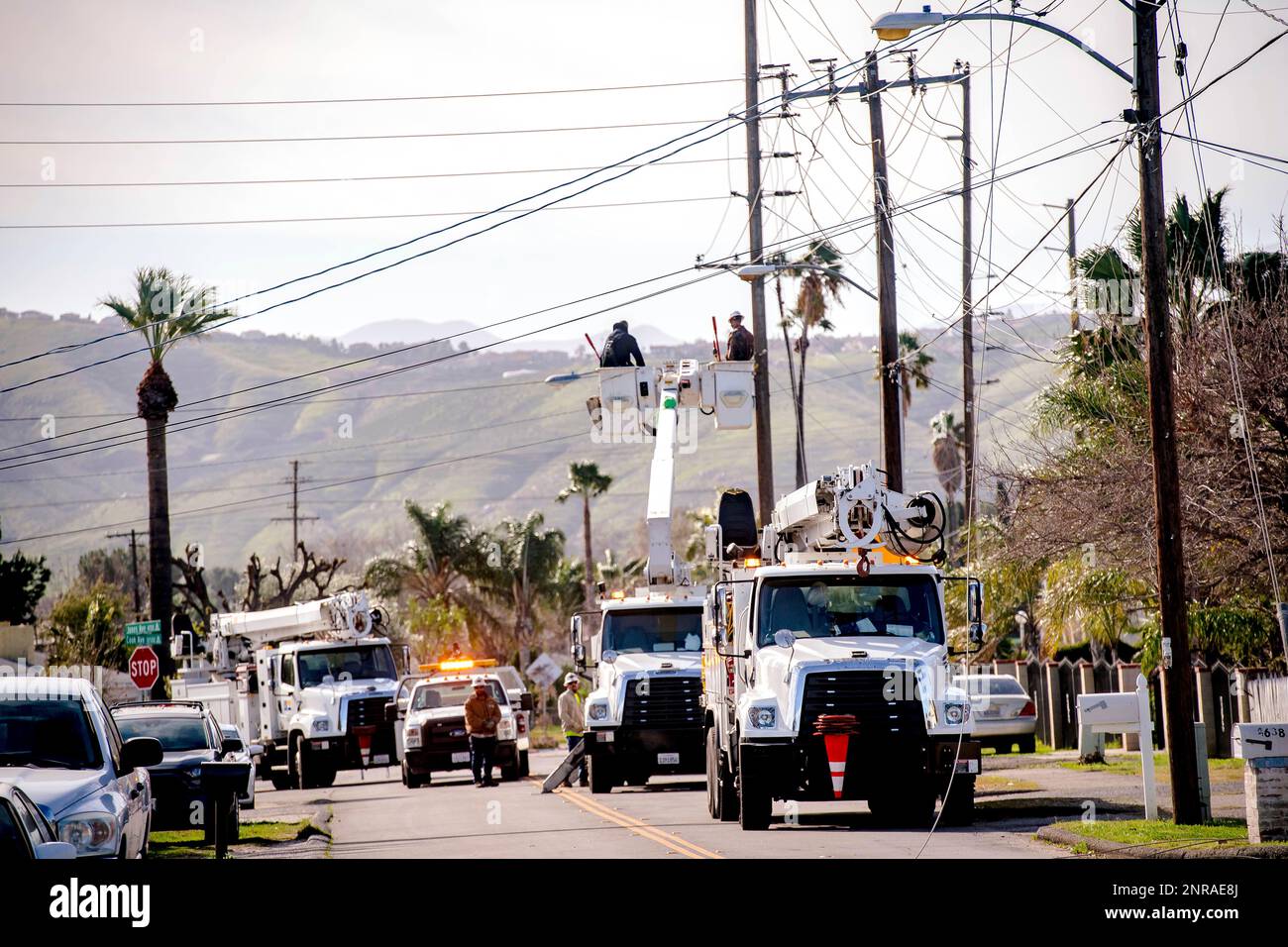 Riverside Public Utilities journeymen linemen repair power lines after ...