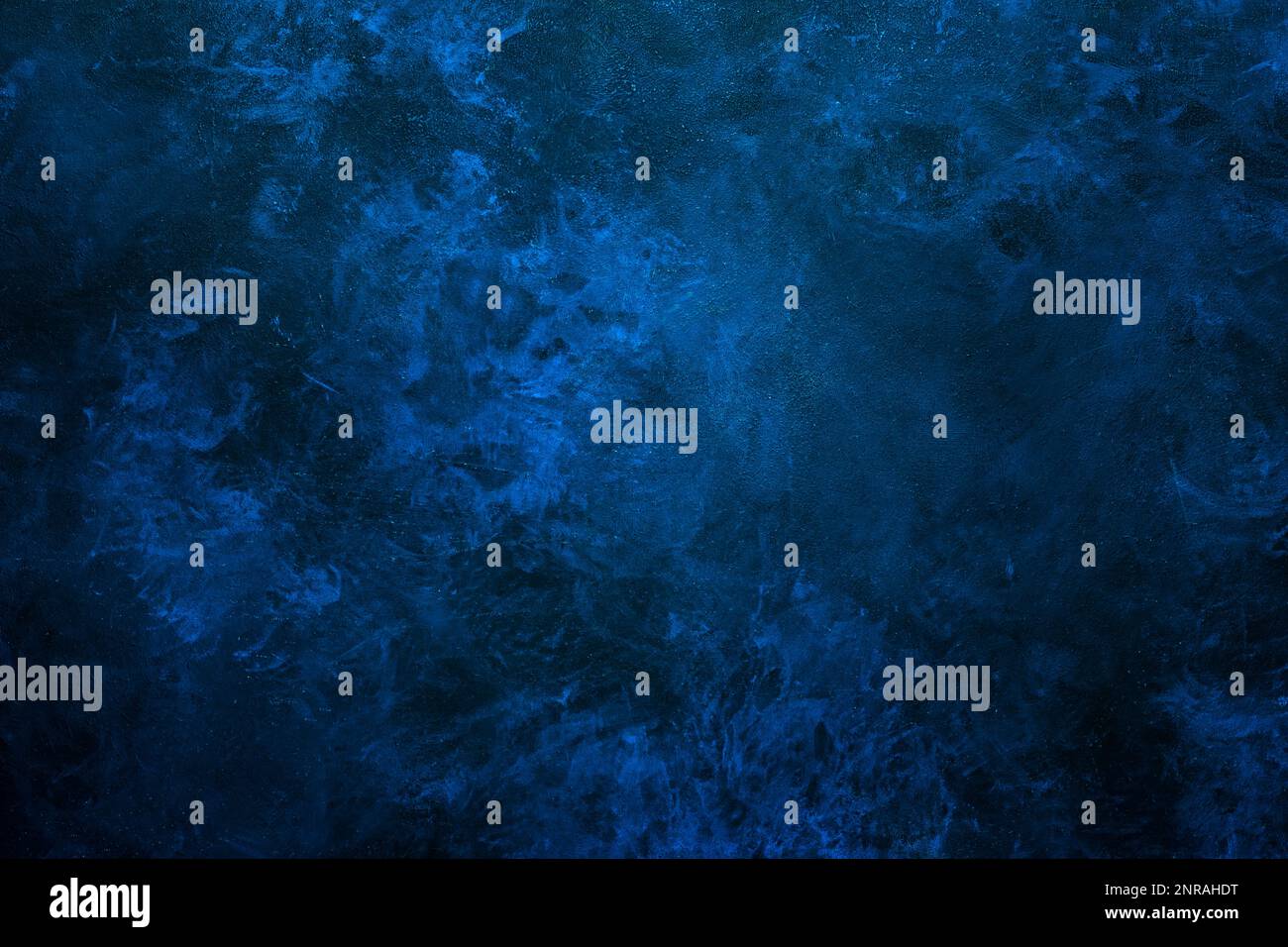 Deep blue texture or background with stains, waves and grain elements ...