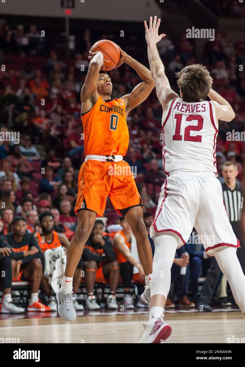 NORMAN, OK - FEBRUARY 01: Oklahoma State (0) Avery Anderson shooting a jump shot while Oklahoma ...