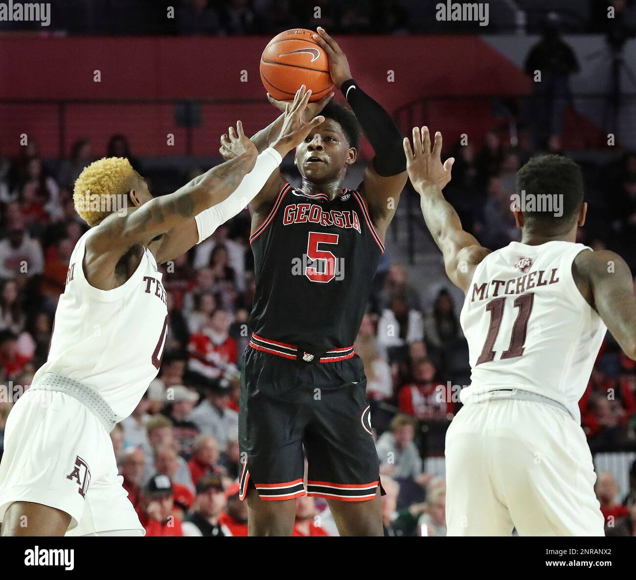 Georgia guard Anthony Edwards shoots over a double team by Texas A&M ...