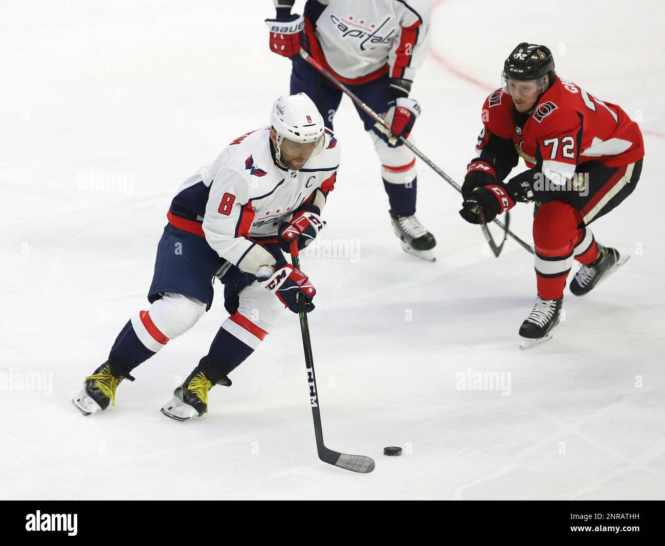 Washington Capitals left wing Alex Ovechkin (8) skates past Ottawa ...