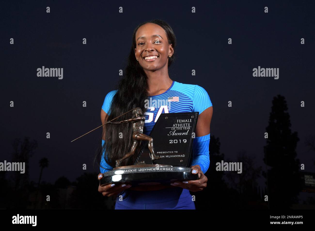 Dalilah Muhammad (USA) poses with the USA Track & Field Jackie Joyner ...