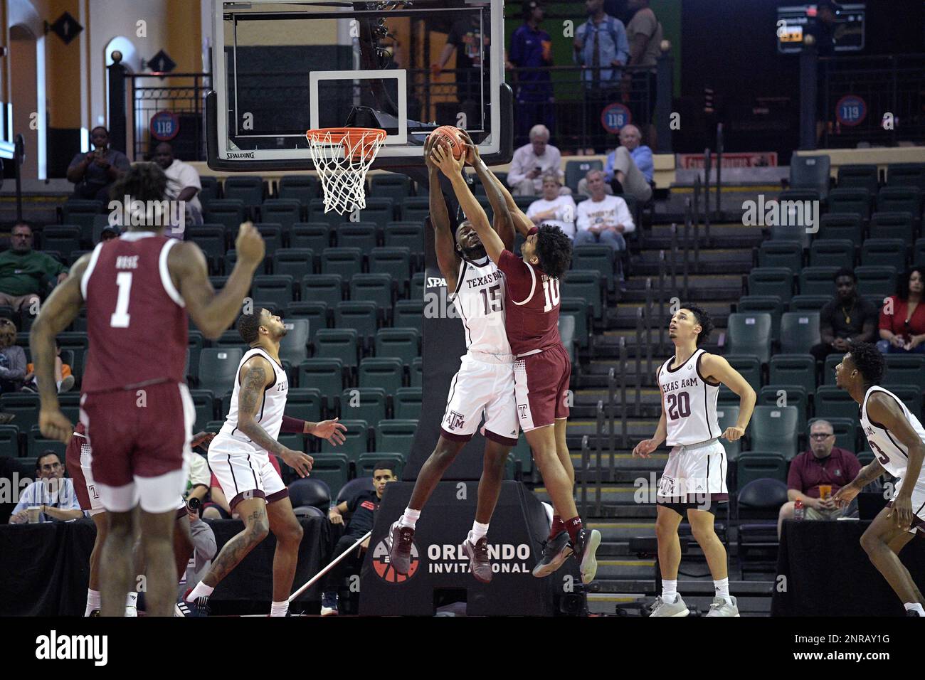 Texas A&M forward Jonathan Aku (15) and Temple forward Jake Forrester ...