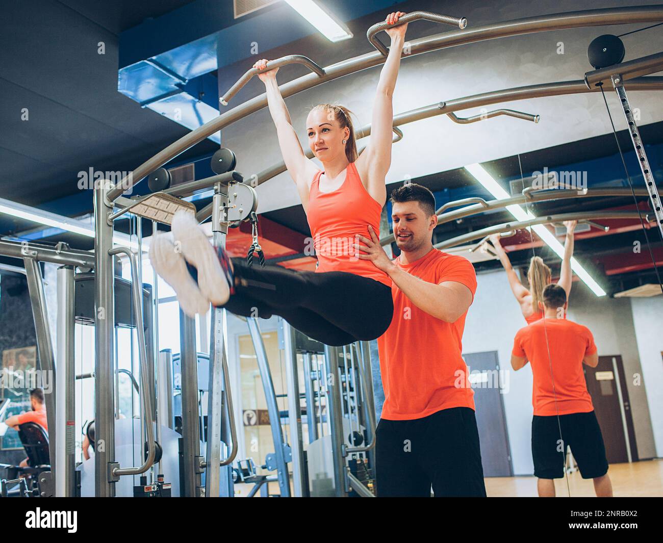 Pull-ups happy training gym woman sport concept Stock Photo - Alamy