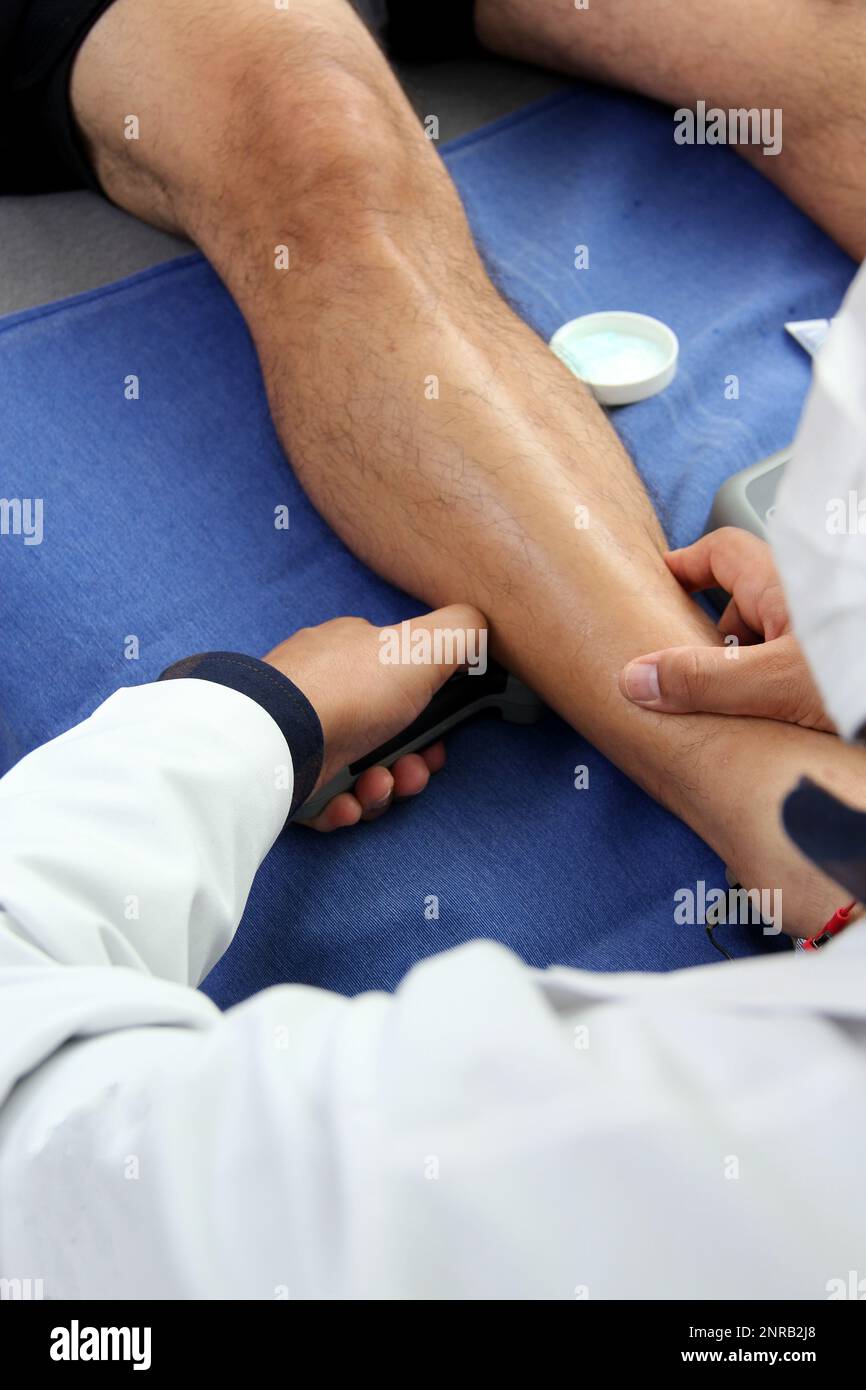 Electromyography EMG and Somatosensory Evoked Potential PEV of lower ...