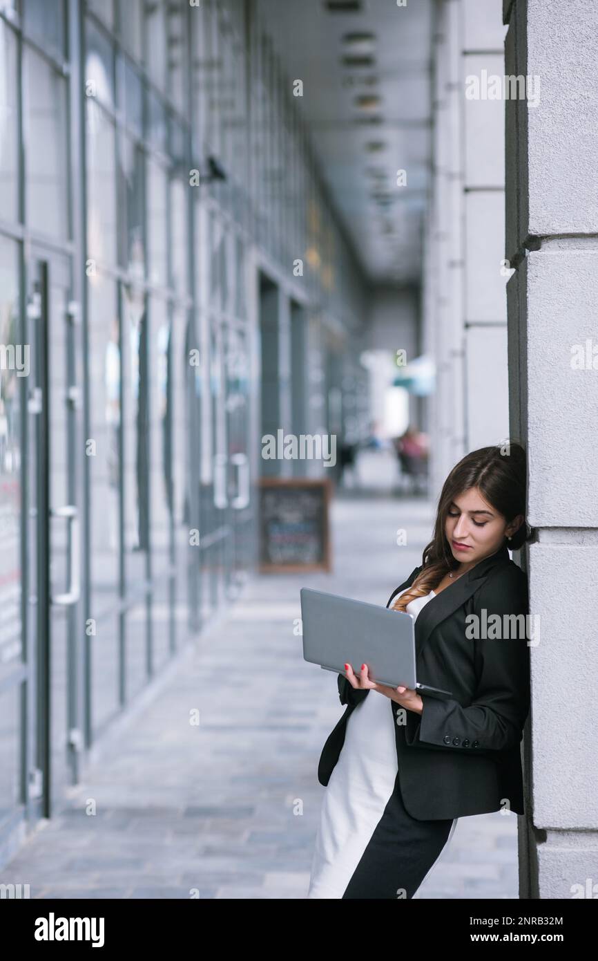 Communication in social media. Sad girl on street Stock Photo - Alamy