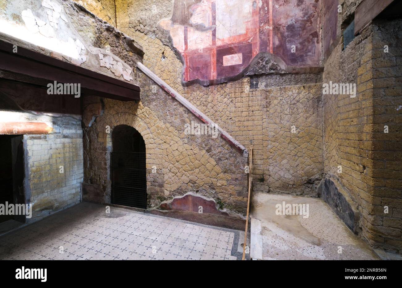 View of a mosaic tile floor and a staircase, steps at Casa del Bel ...
