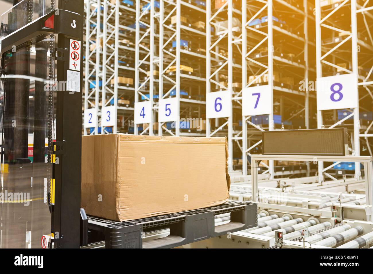 The warehouse full of goods, boxes and shelves in order. Industrial ...