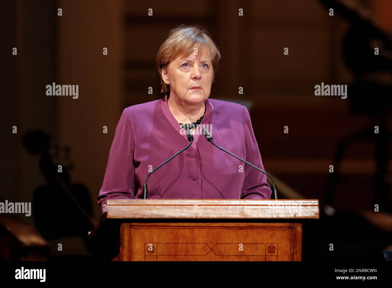 German Chancellor Angela Merkel speaks at a memorial concert to ...