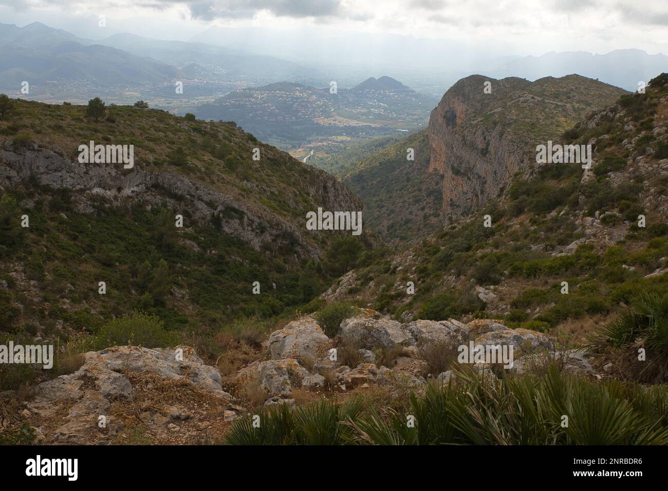 View of Montgó mountain in Spain with its cliffy, green surroundings ...