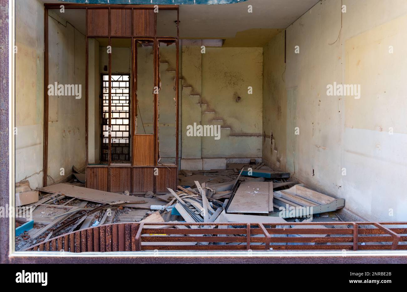 Deserted and abandoned house room with home objects and clothes on the ...