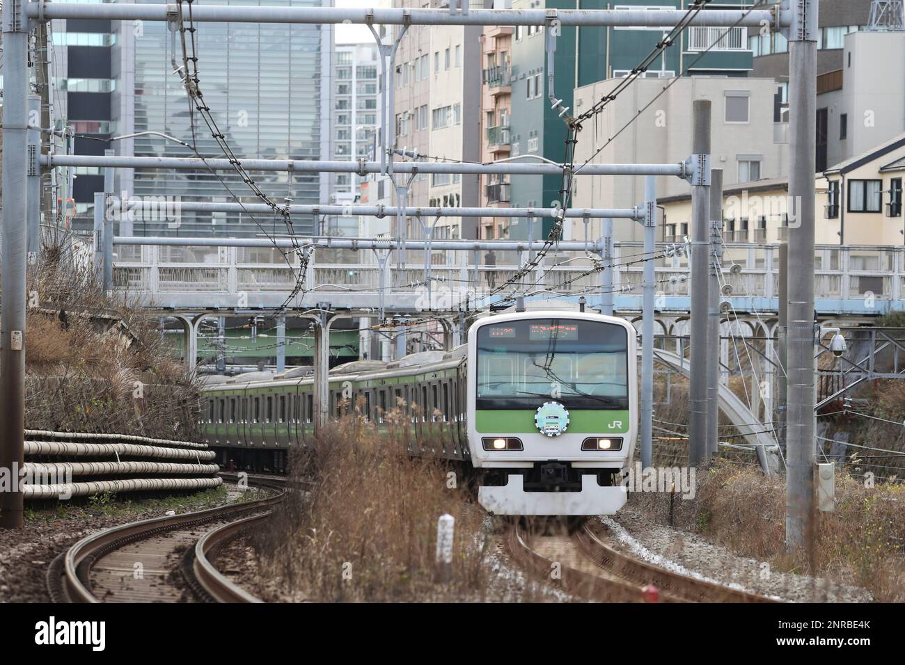 Yamanote Line train runs in Tokyo on Jan. 16, 2020. E231 series of ...