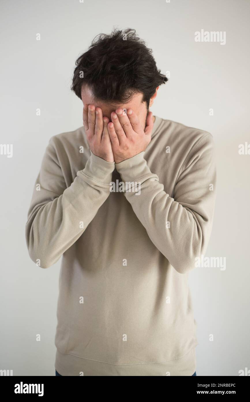 Man hiding face hi-res stock photography and images - Alamy
