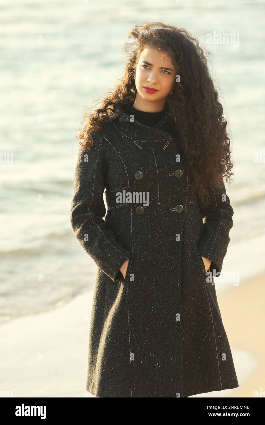 Middle eastern woman coat hi-res stock photography and images - Alamy