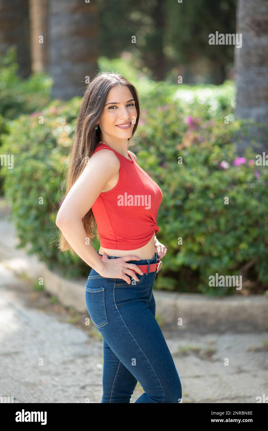 Happy beautiful woman standing outdoors Stock Photo - Alamy