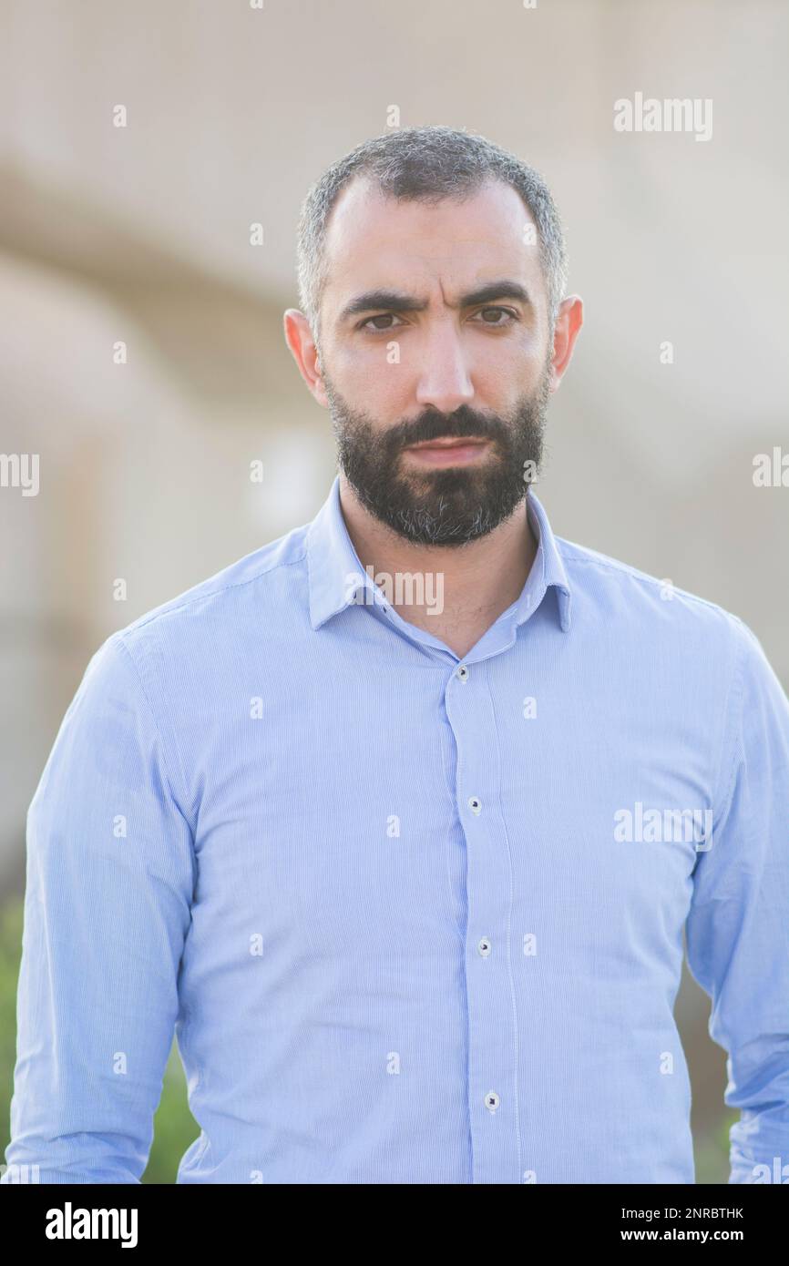 Angry middle eastern man staring Stock Photo - Alamy
