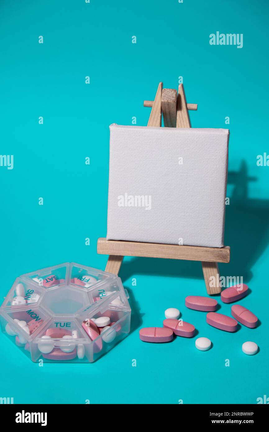 Closeup of medical pill box with doses of tablets for daily take ...