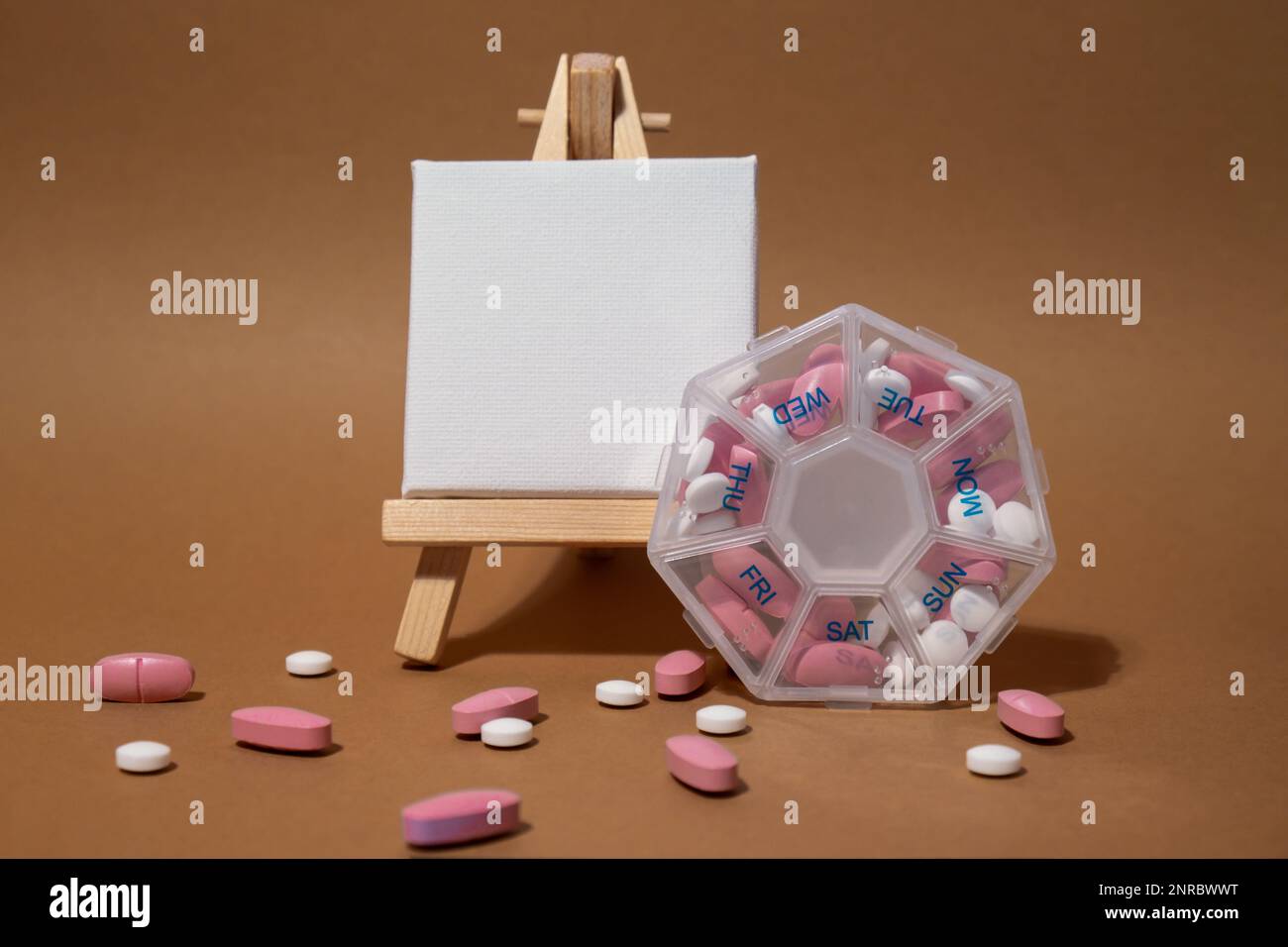Closeup of medical pill box with doses of tablets for daily take ...