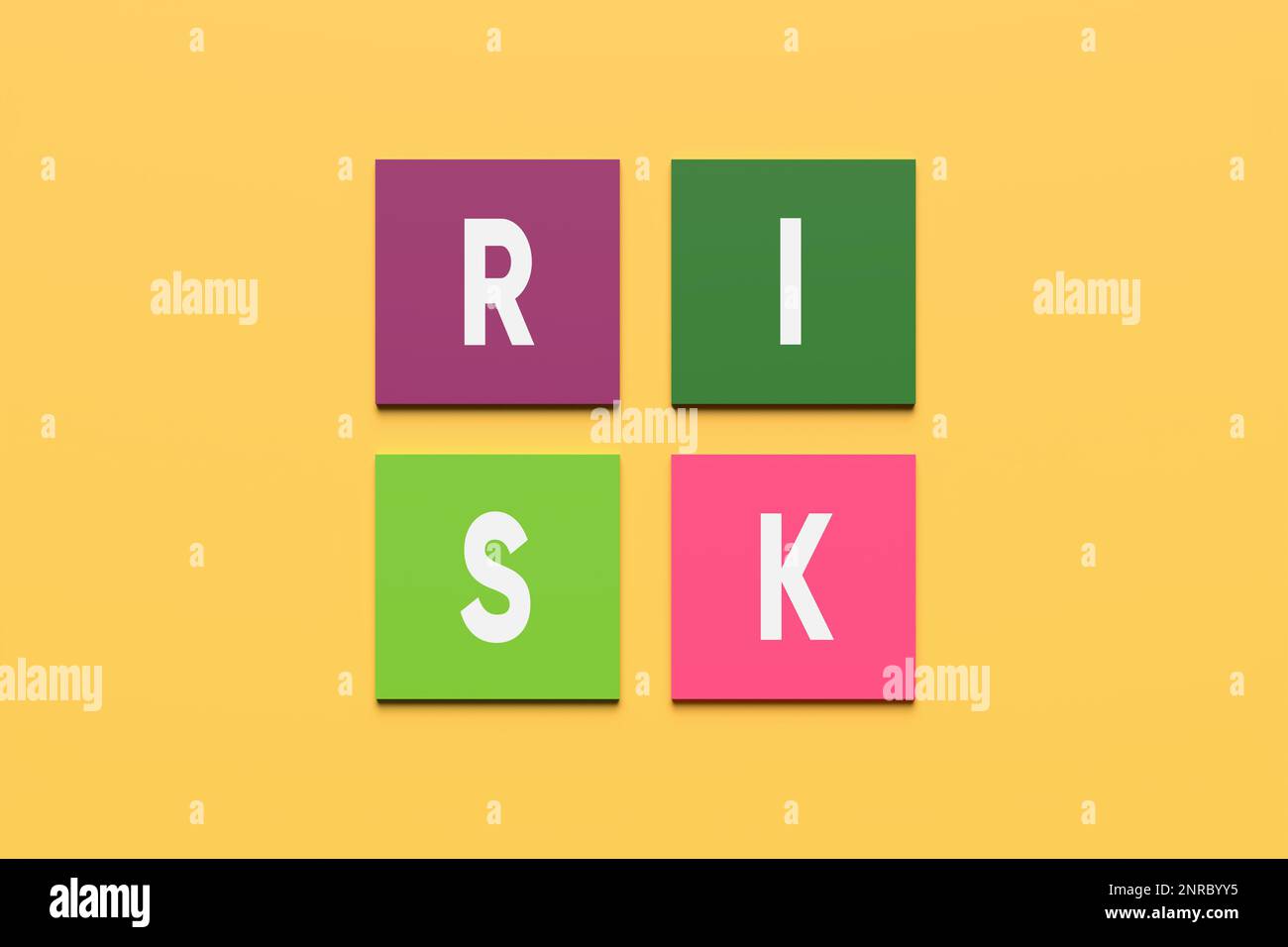 The word risk on colorful square blocks on yellow background. Business ...